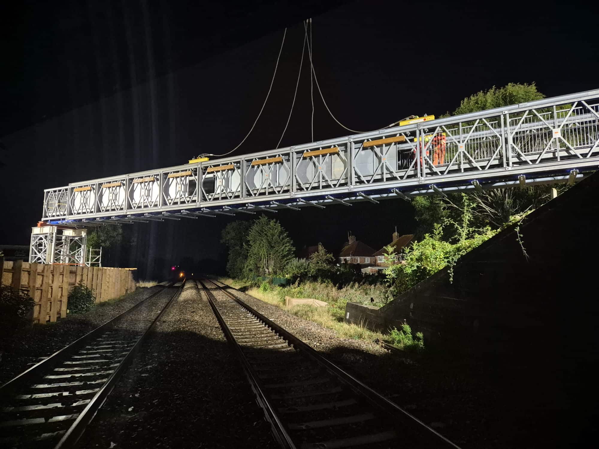 Temporary footbridge swung into place on Winterstoke Road - WEST